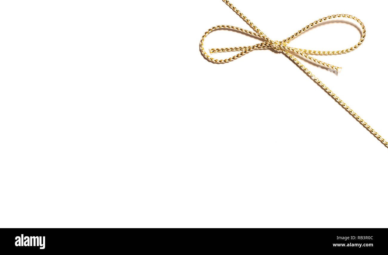 Golden satin rope upper right corner with knotted bow gift ribbon wrap ...
