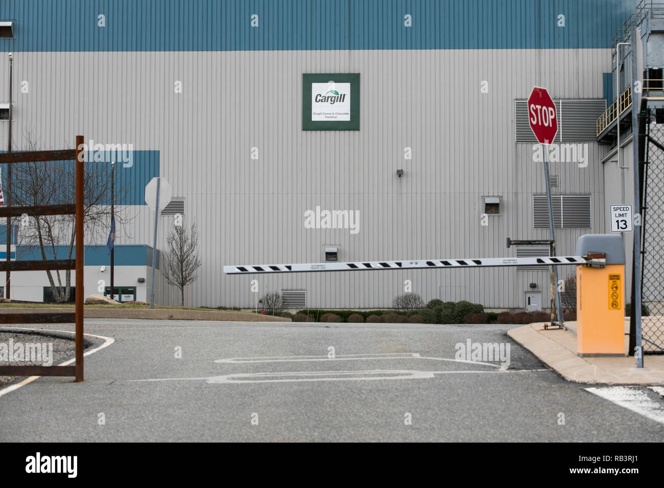 A logo sign outside of a facility occupied by Cargill Cocoa & Chocolate ...