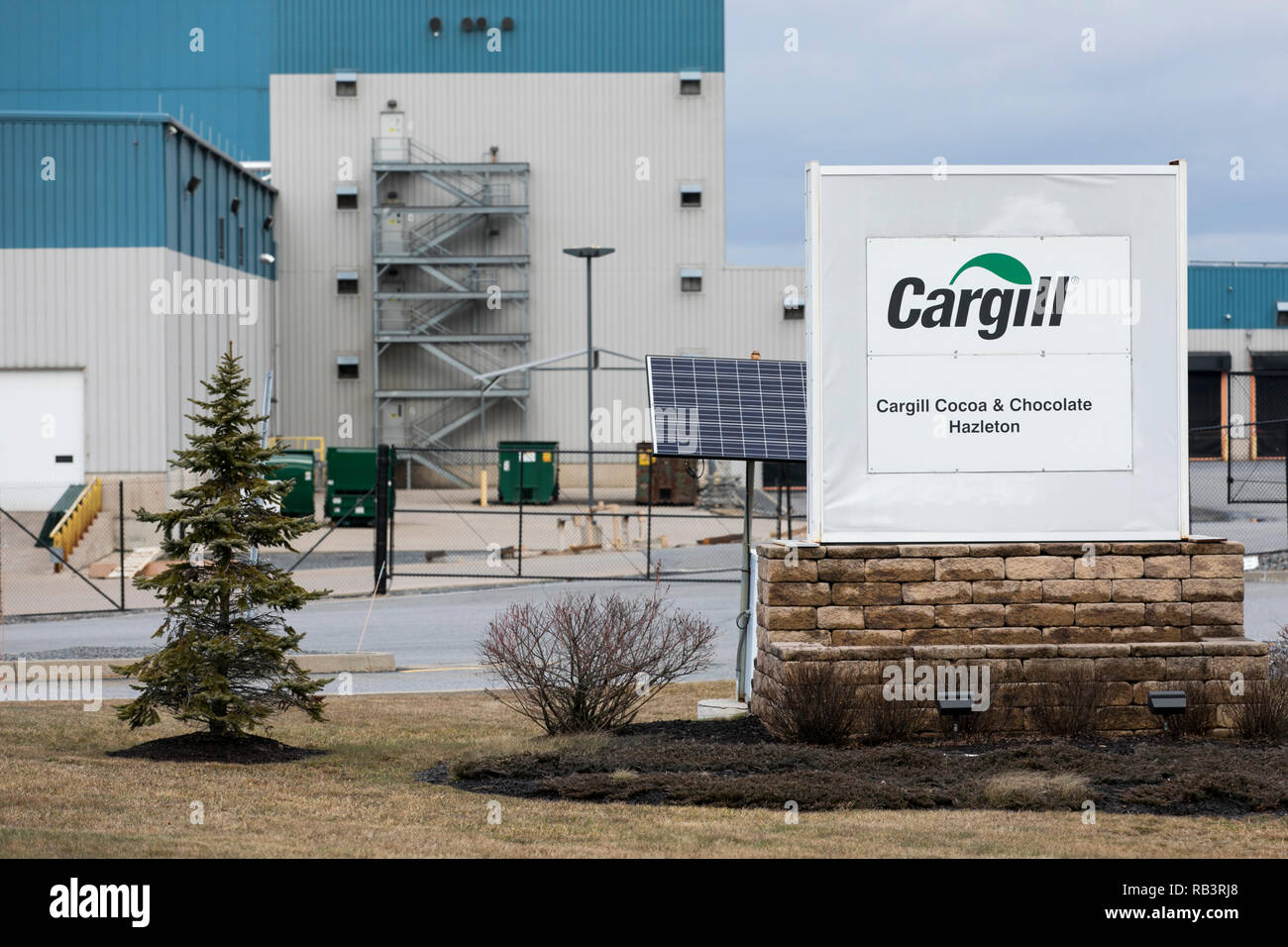 A logo sign outside of a facility occupied by Cargill Cocoa & Chocolate ...