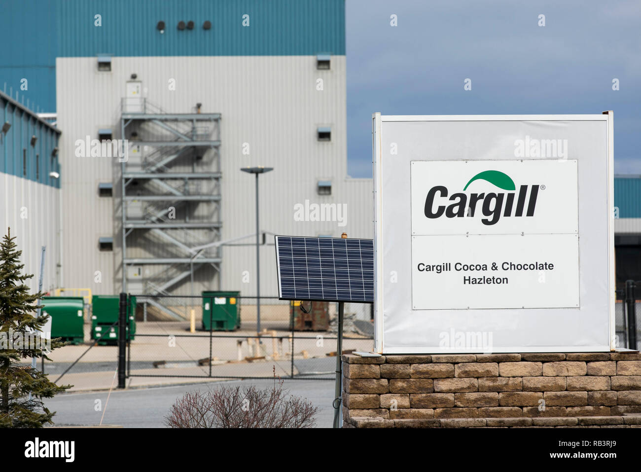 A logo sign outside of a facility occupied by Cargill Cocoa & Chocolate ...