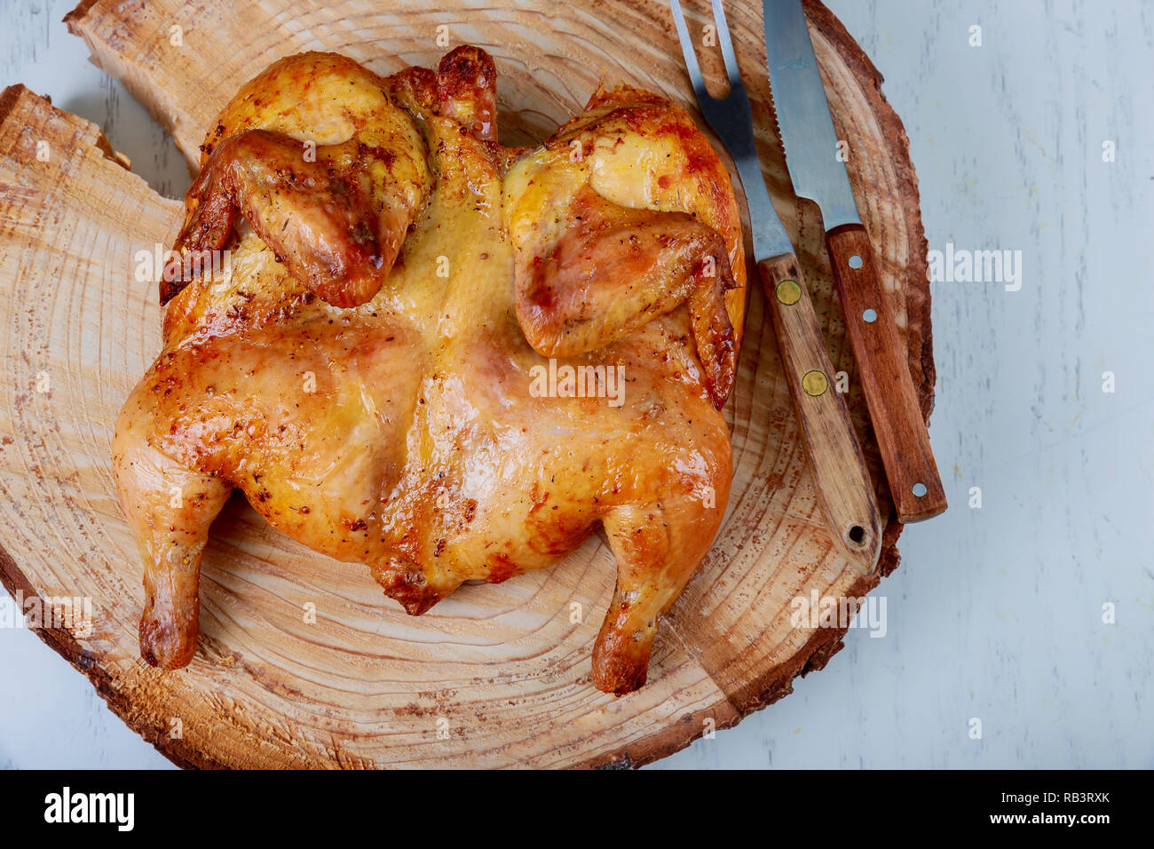 Cutting baked chicken close hi-res stock photography and images - Alamy