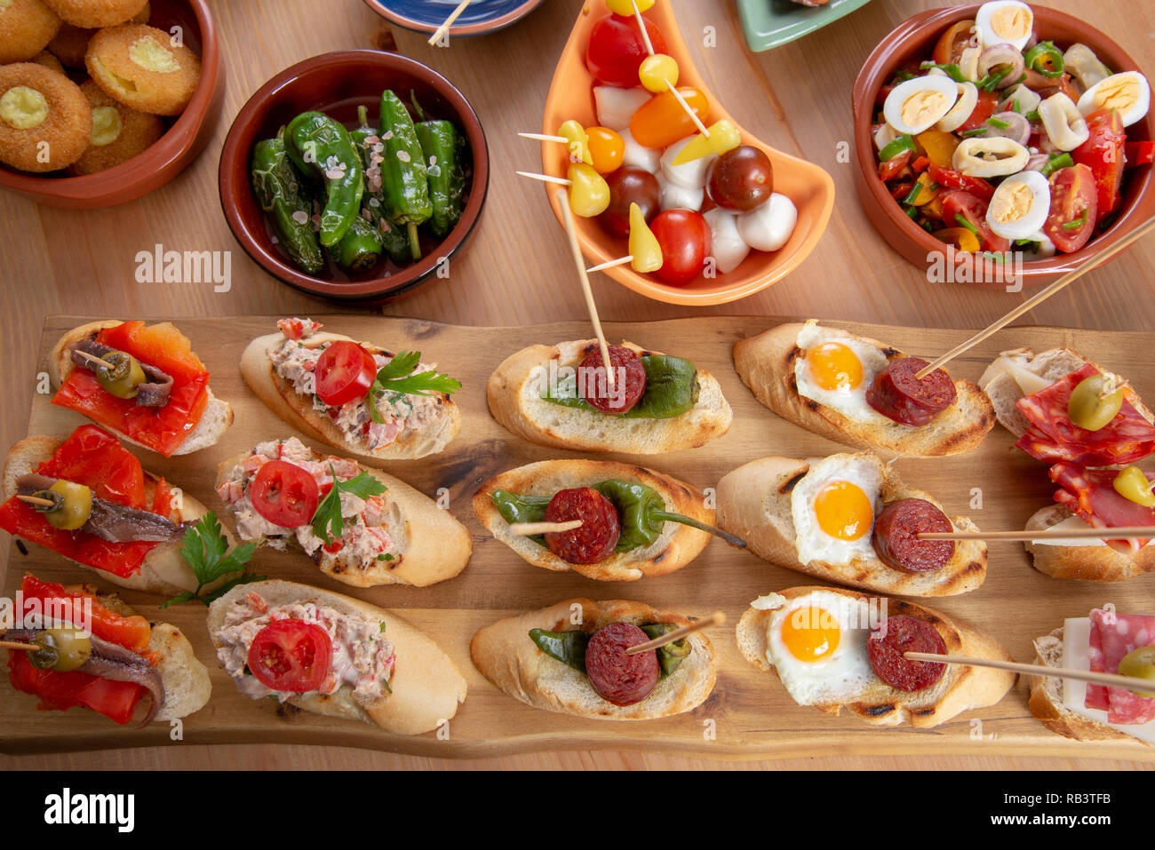 Top view of table with variety of mediterranean appetizers - tapas food ...