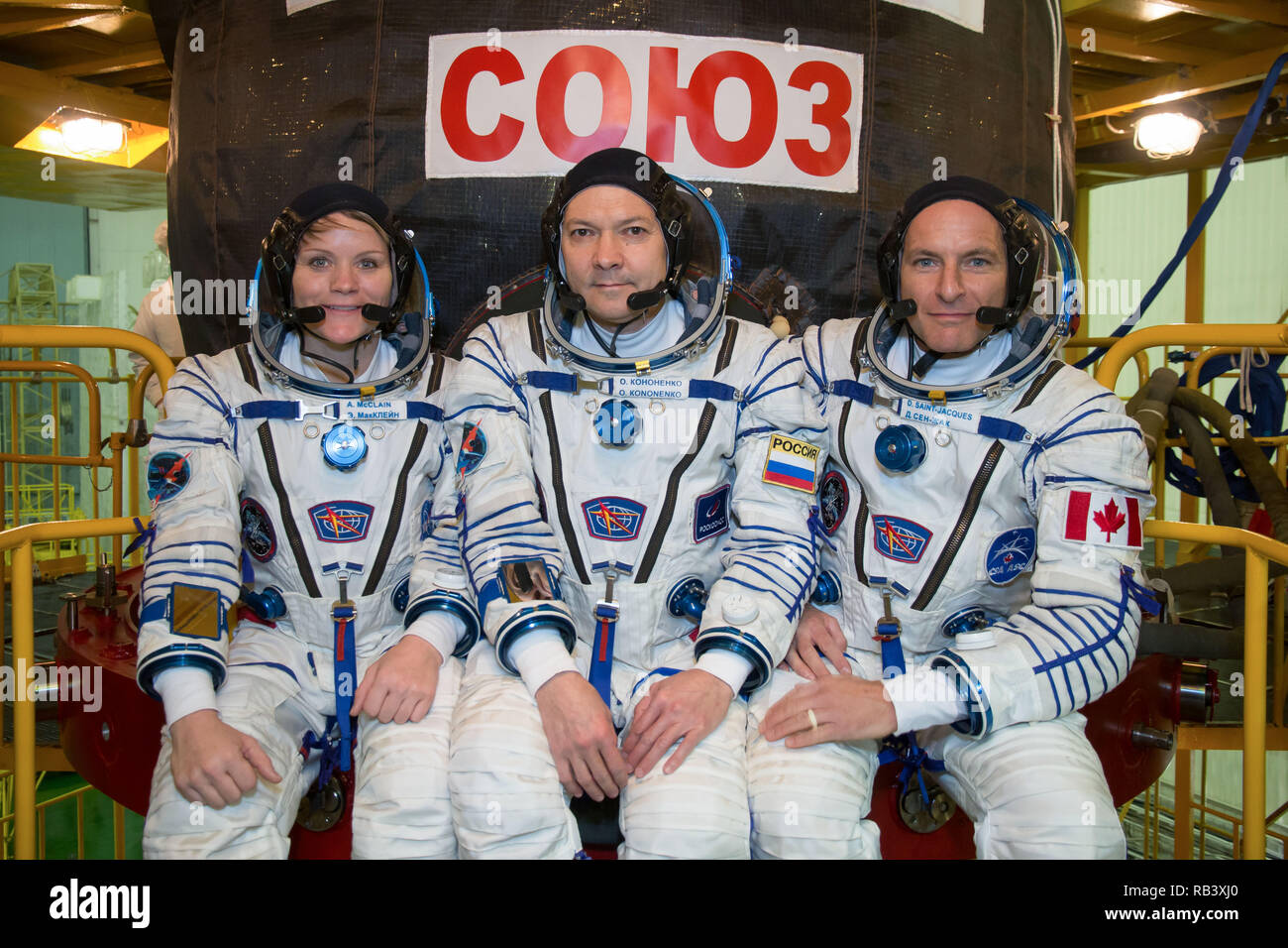 International Space Station Expedition 58 prime crew members Anne McClain of NASA, left, Oleg ...