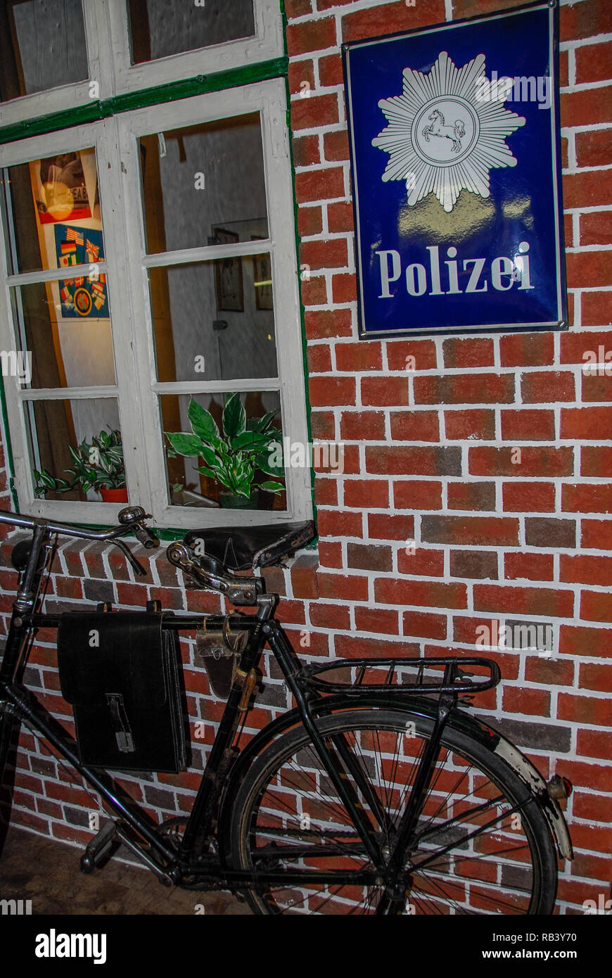 Old german Police office with policeman bike Stock Photo - Alamy