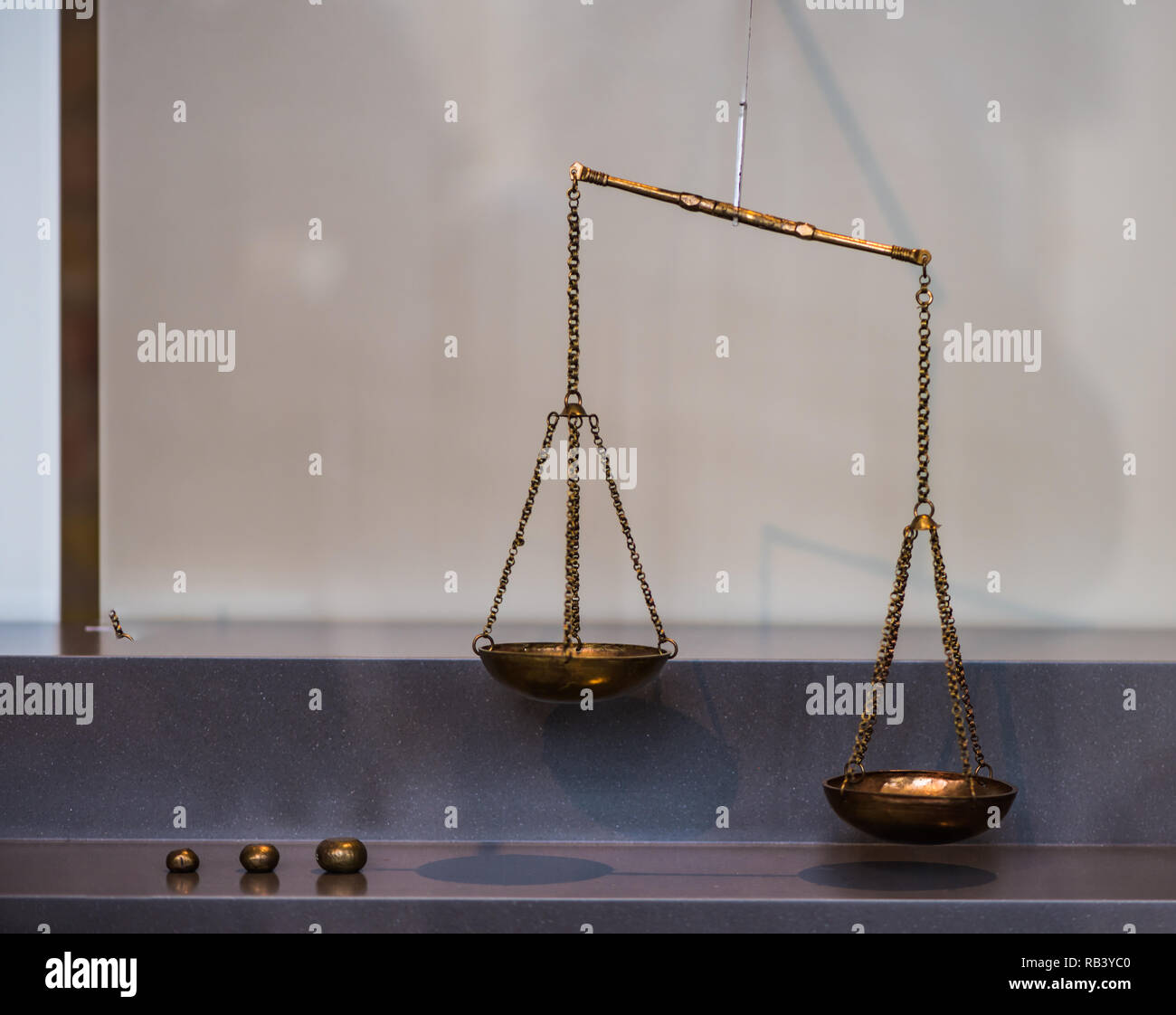 Vintage brass balance with mass Stock Photo - Alamy