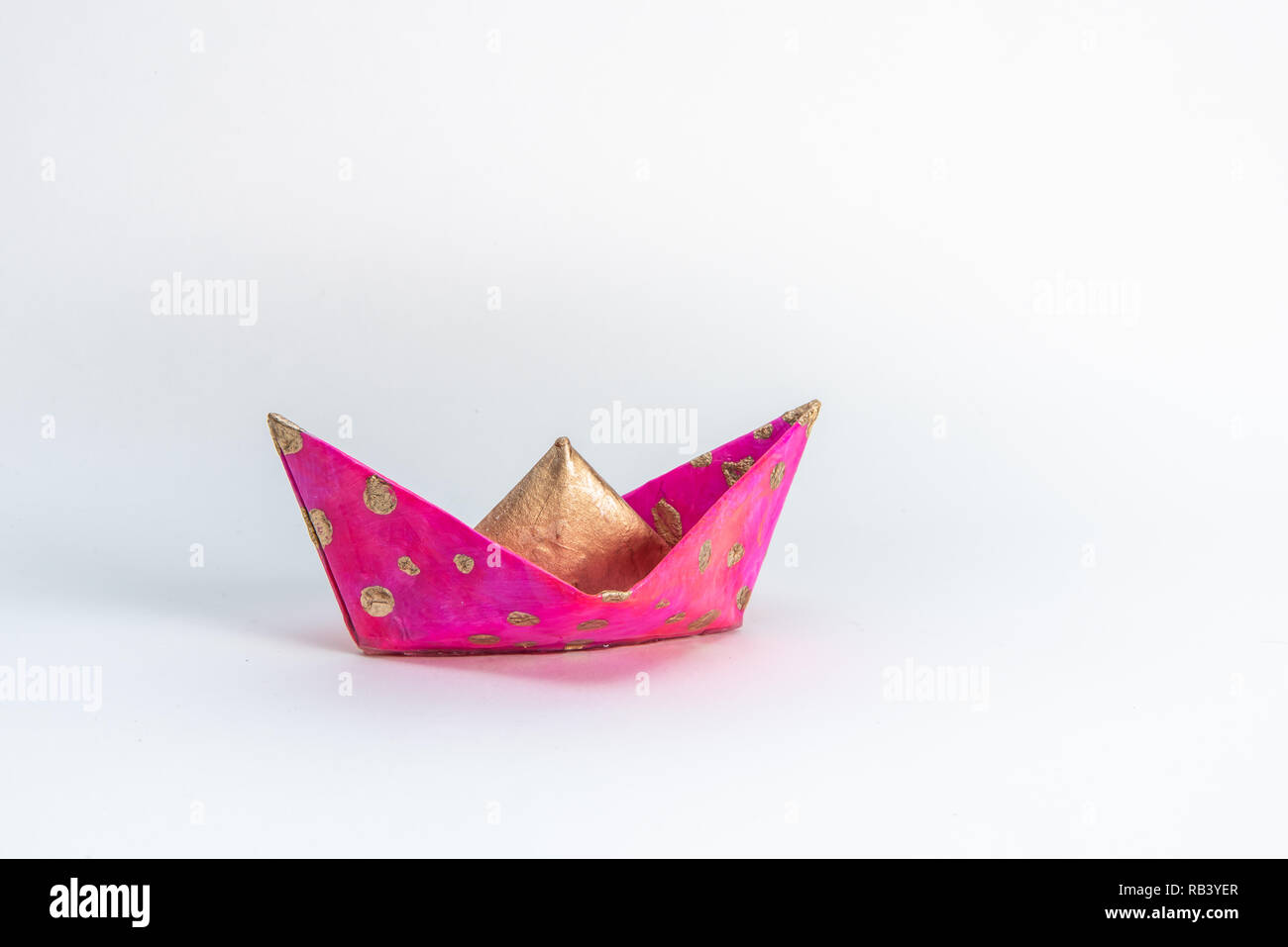 Paper boat origami folding art colored Stock Photo - Alamy