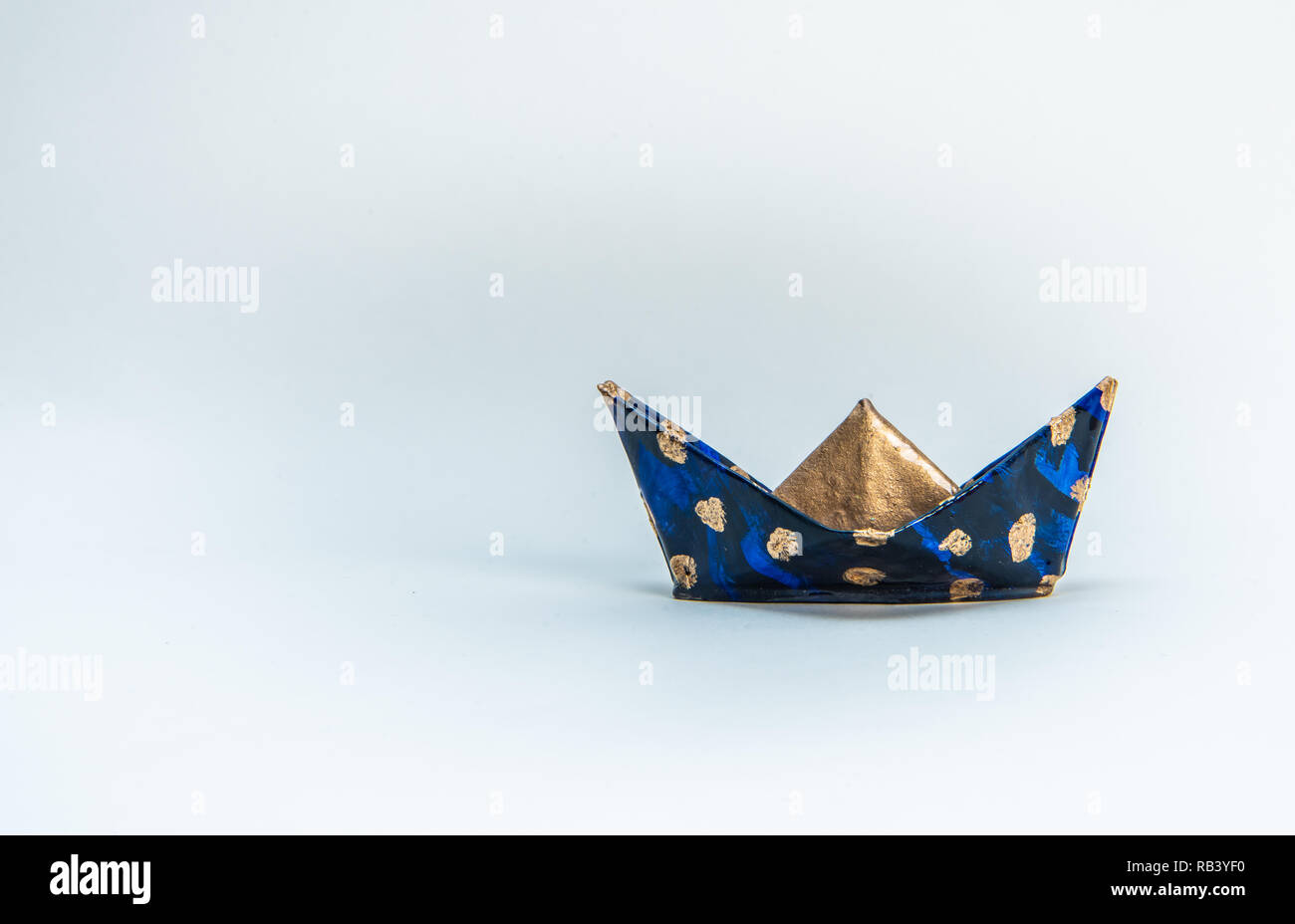 Paper boat origami folding art colored Stock Photo - Alamy