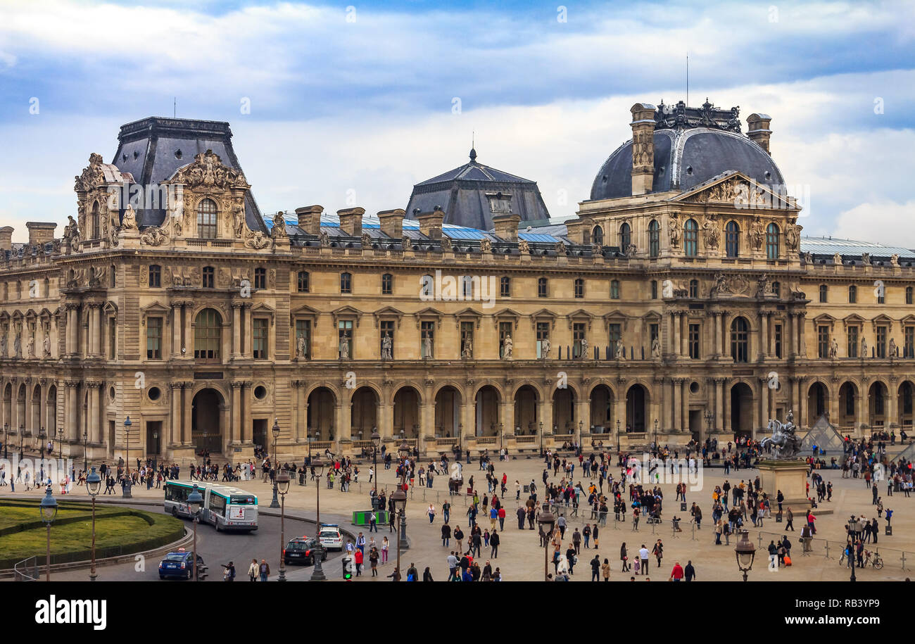 Paris, France - October 25, 2013: Tourists walking in front of the ...