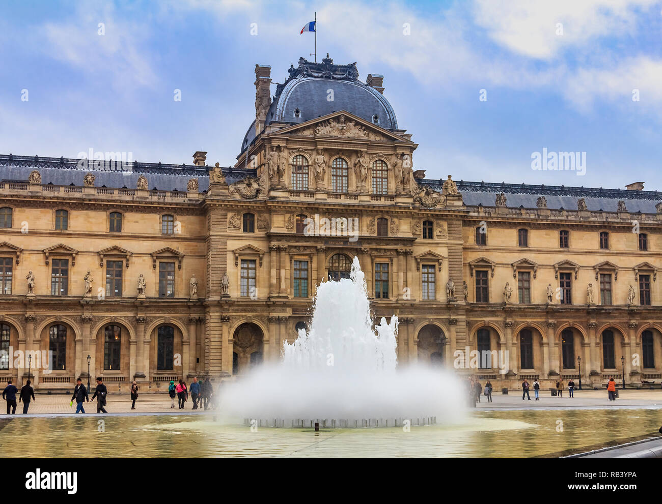 Paris, France - October 25, 2013: Facade of the famous Louvre Museum ...