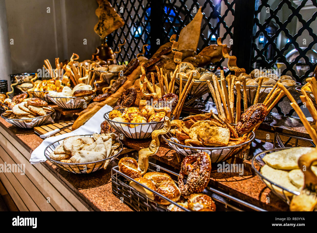 Bread bar station in buffet catering, close-up. Assortment of fresh ...