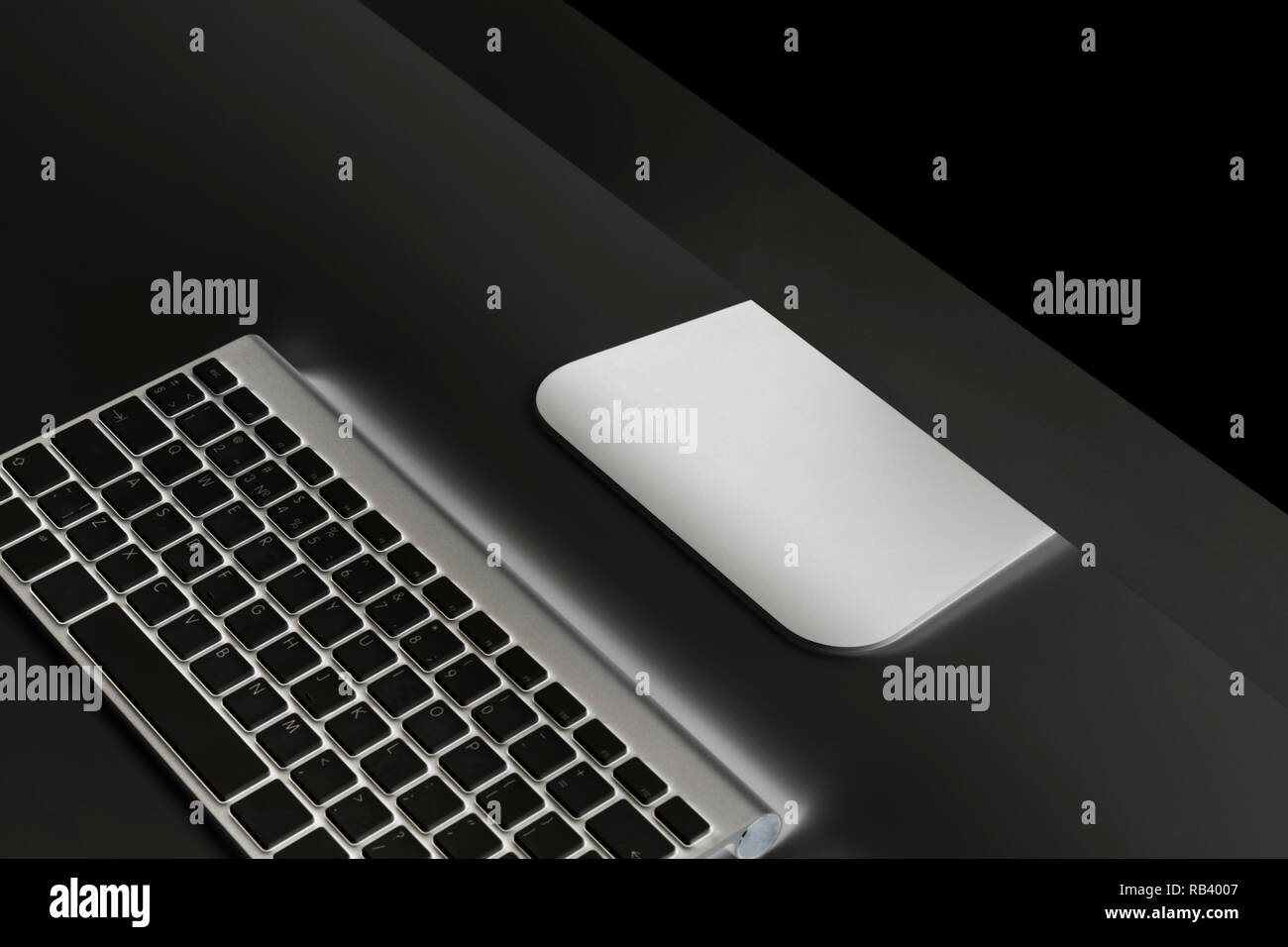 Business workplace with computer wireless keyboard and mouse on old ...