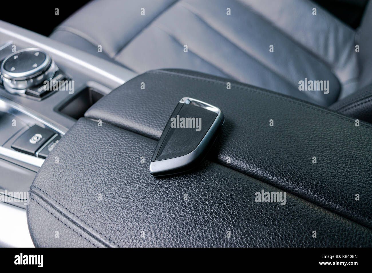 Closeup inside vehicle of wireless key ignition. Start engine key. Car ...