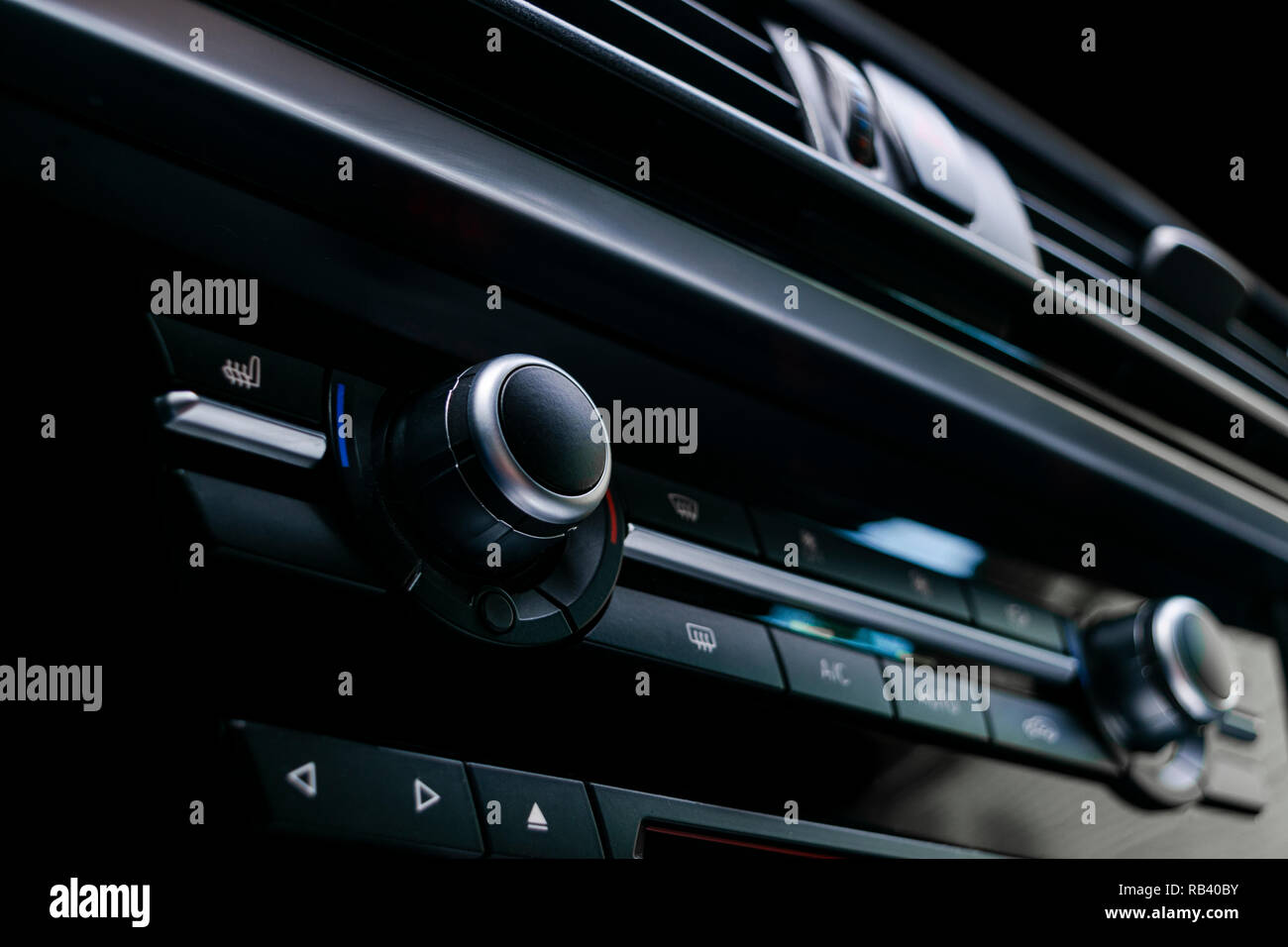 Air conditioning button inside a car. Climate control AC unit in the ...