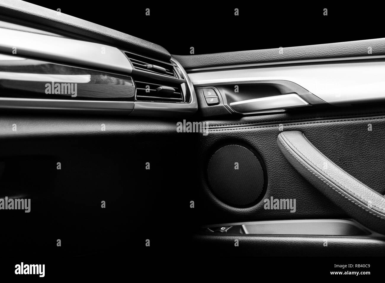 Door handle with Power window control buttons of a luxury passenger car ... Door handle with Power window control buttons of a luxury passenger car ...