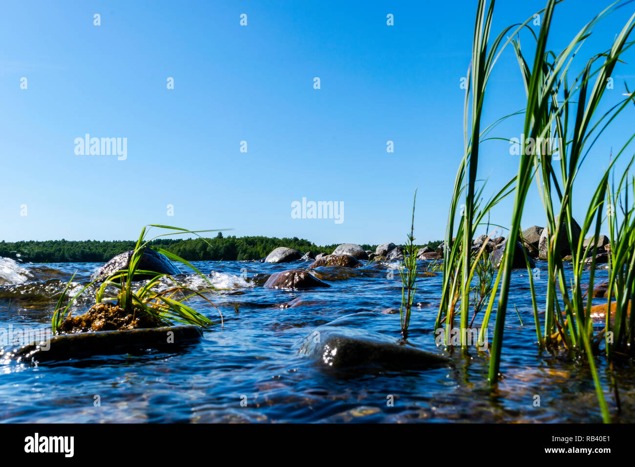 Water splashing over a rock hi-res stock photography and images - Alamy