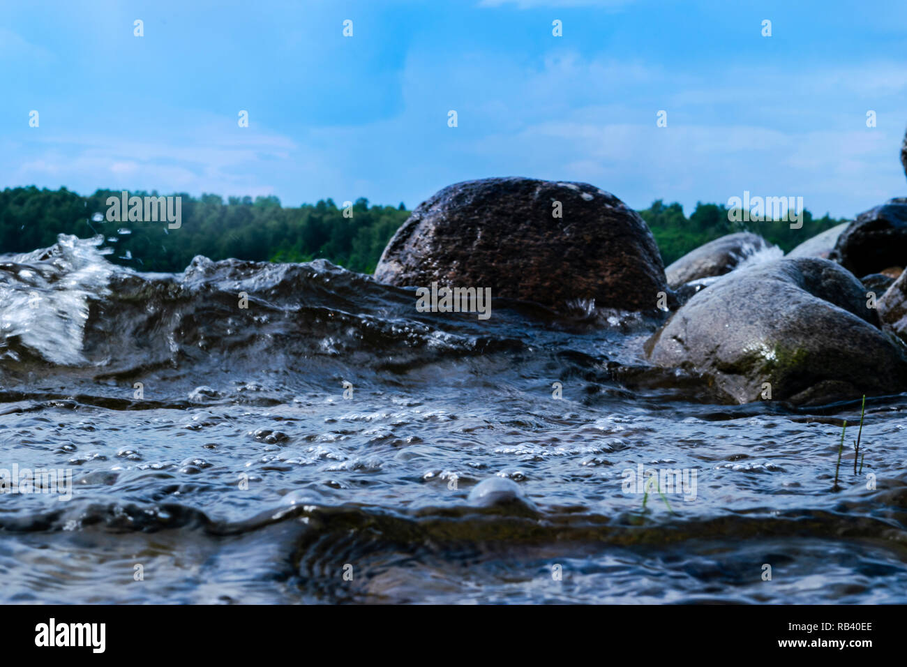 Water splashing against rocks hi-res stock photography and images - Alamy