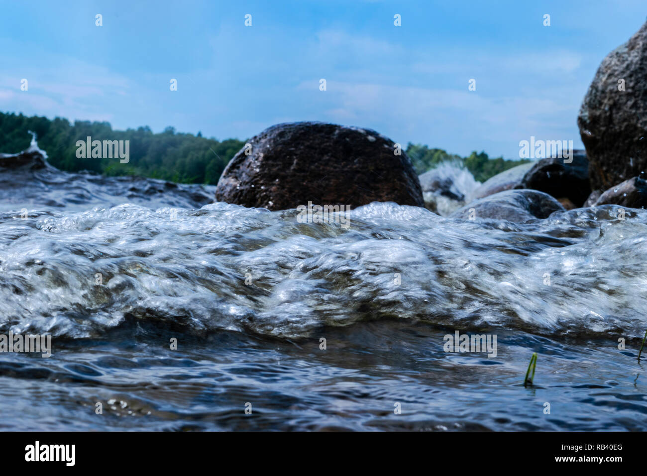 Water splashing against rocks hi-res stock photography and images - Alamy