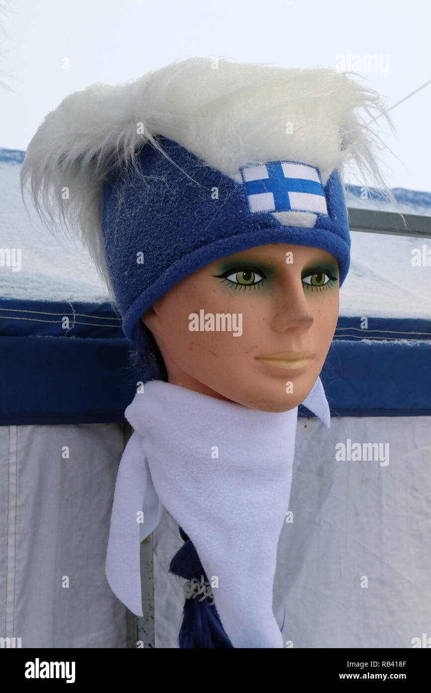 Finnish blue and white hat for sale at market stall Stock Photo - Alamy