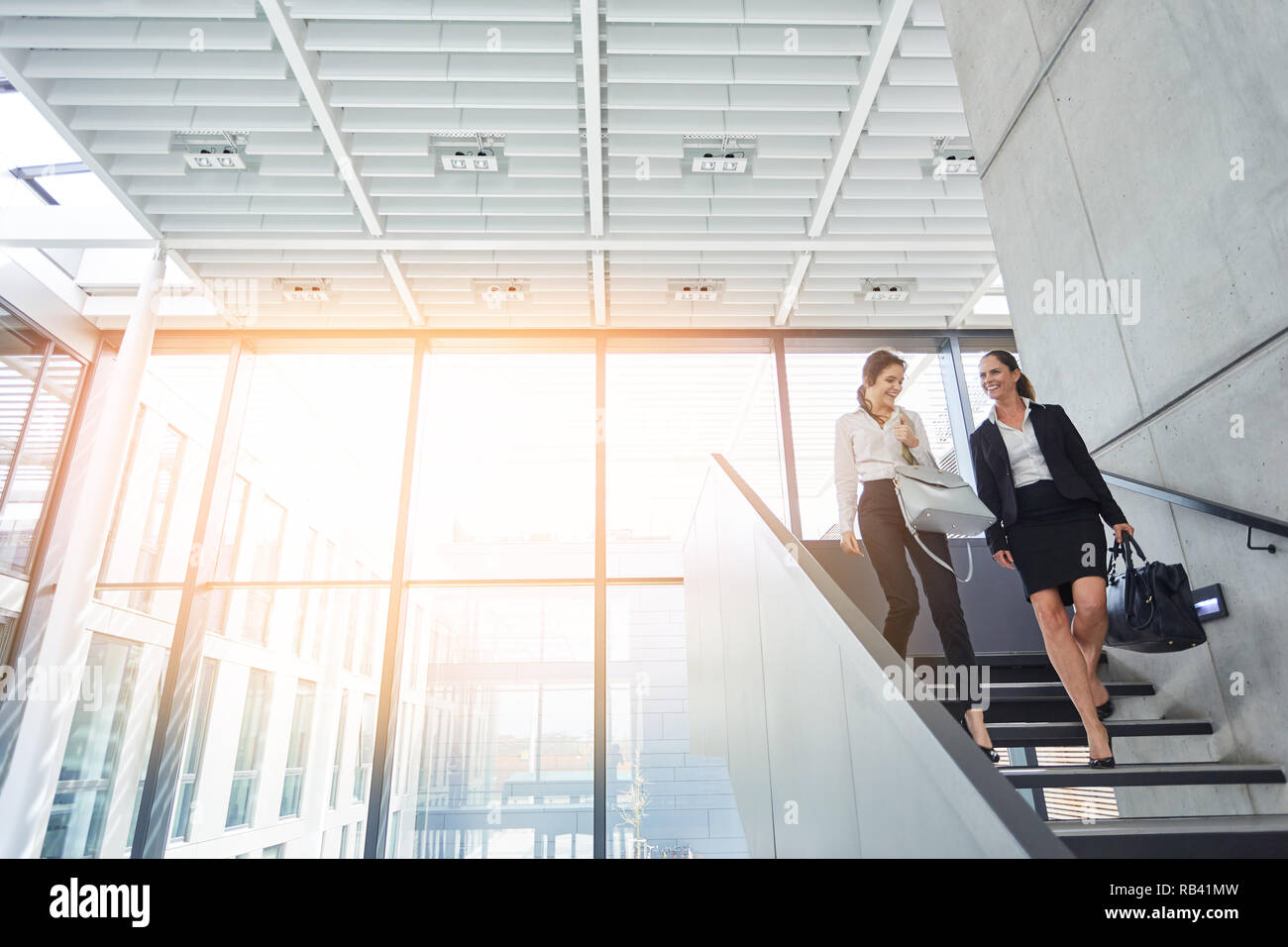 Two women talk manager hi-res stock photography and images - Alamy