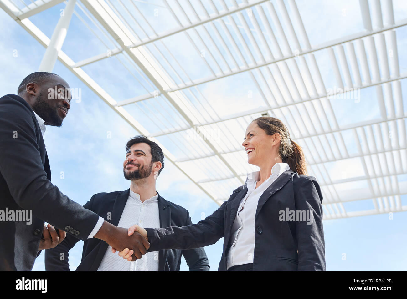 Happy cooperation hi-res stock photography and images - Alamy