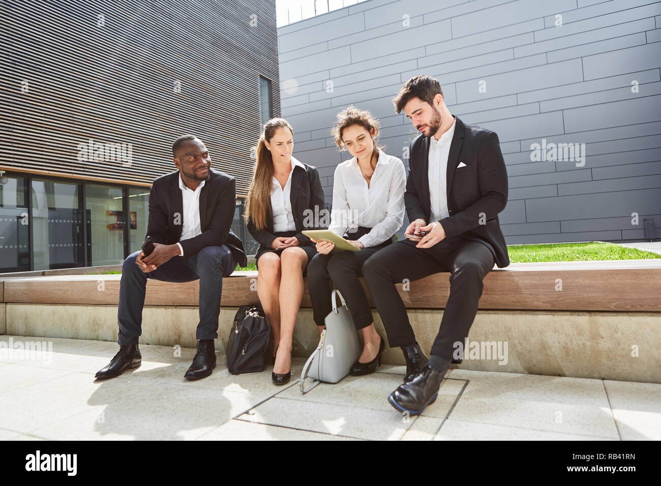 People Working Together As A Team Outside