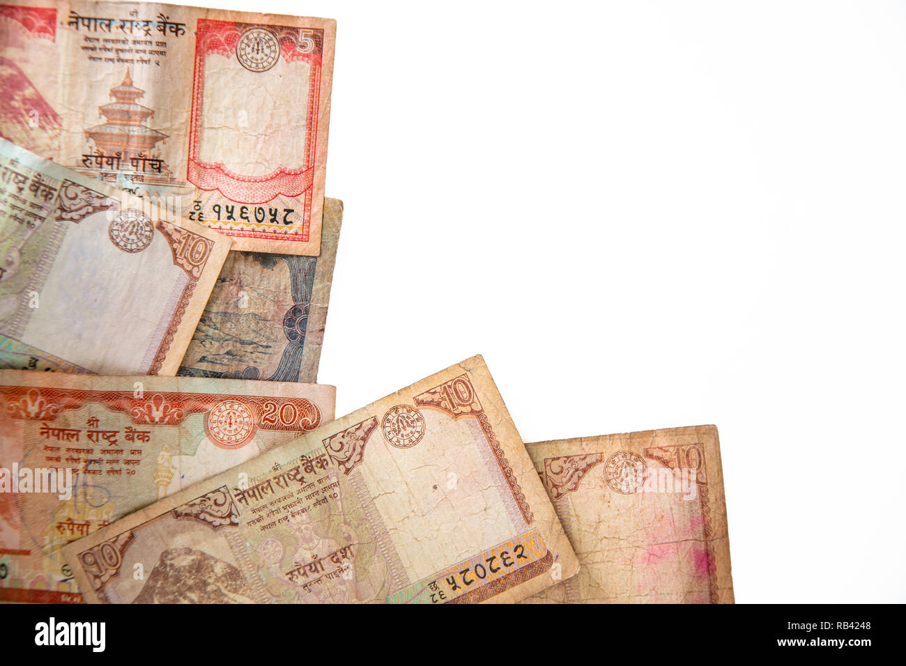 Bank notes of Nepal, the Rupee sit on a white background Stock Photo ...