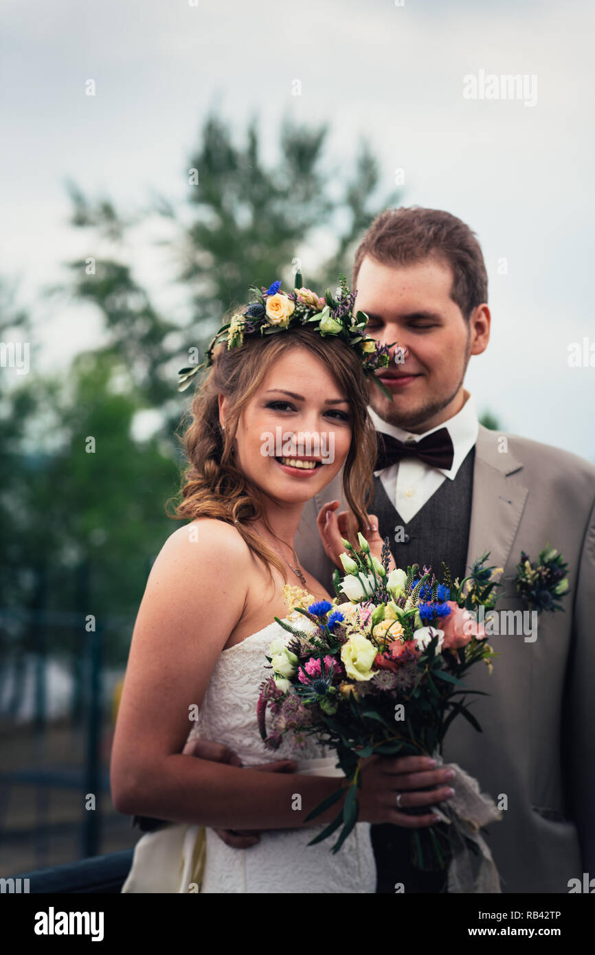 Young bride and groom in the style of provence Stock Photo - Alamy