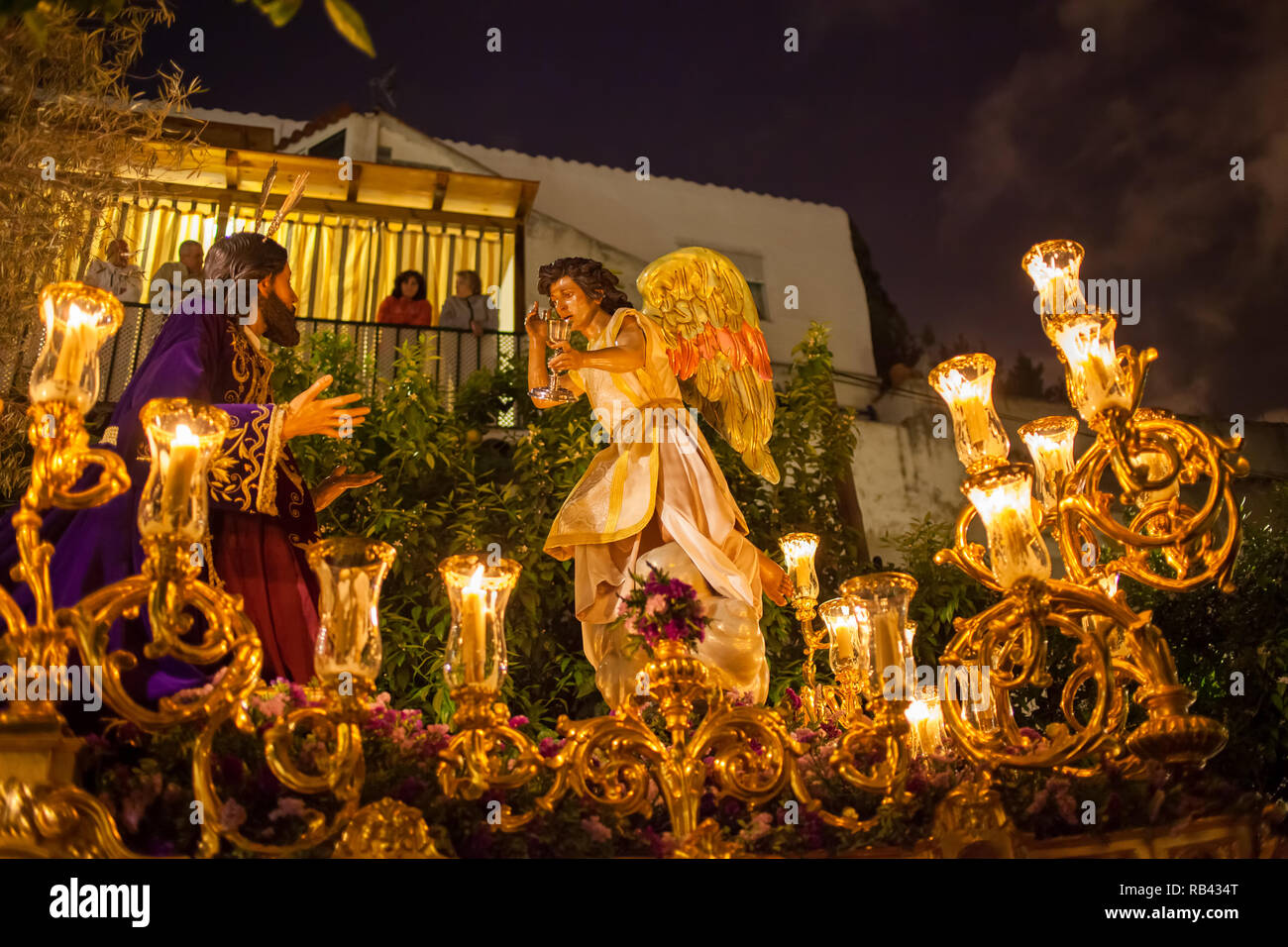 Jesus Christ and Angel on a gilded platform in procession during Holy ...