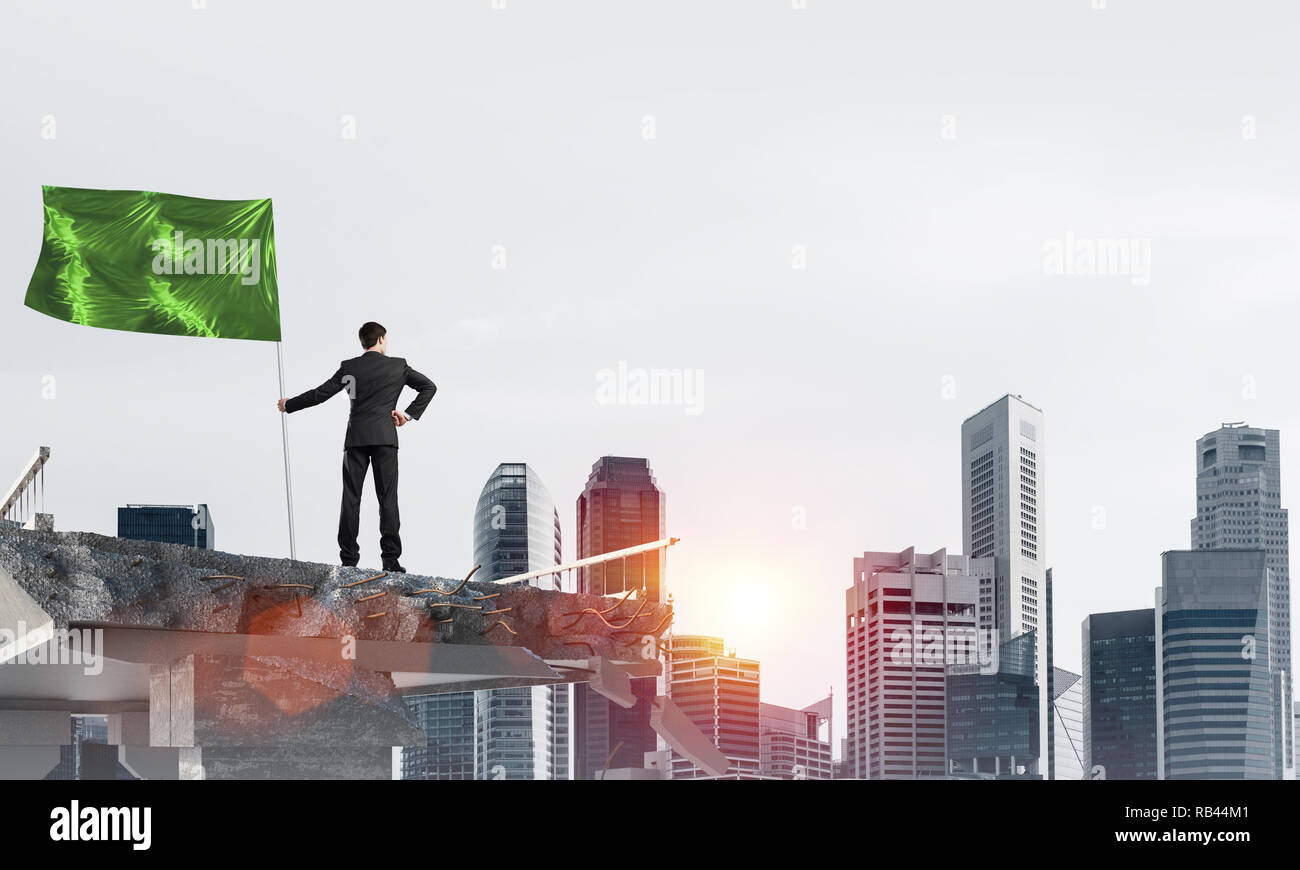 Man with flag presenting leadership concept Stock Photo - Alamy