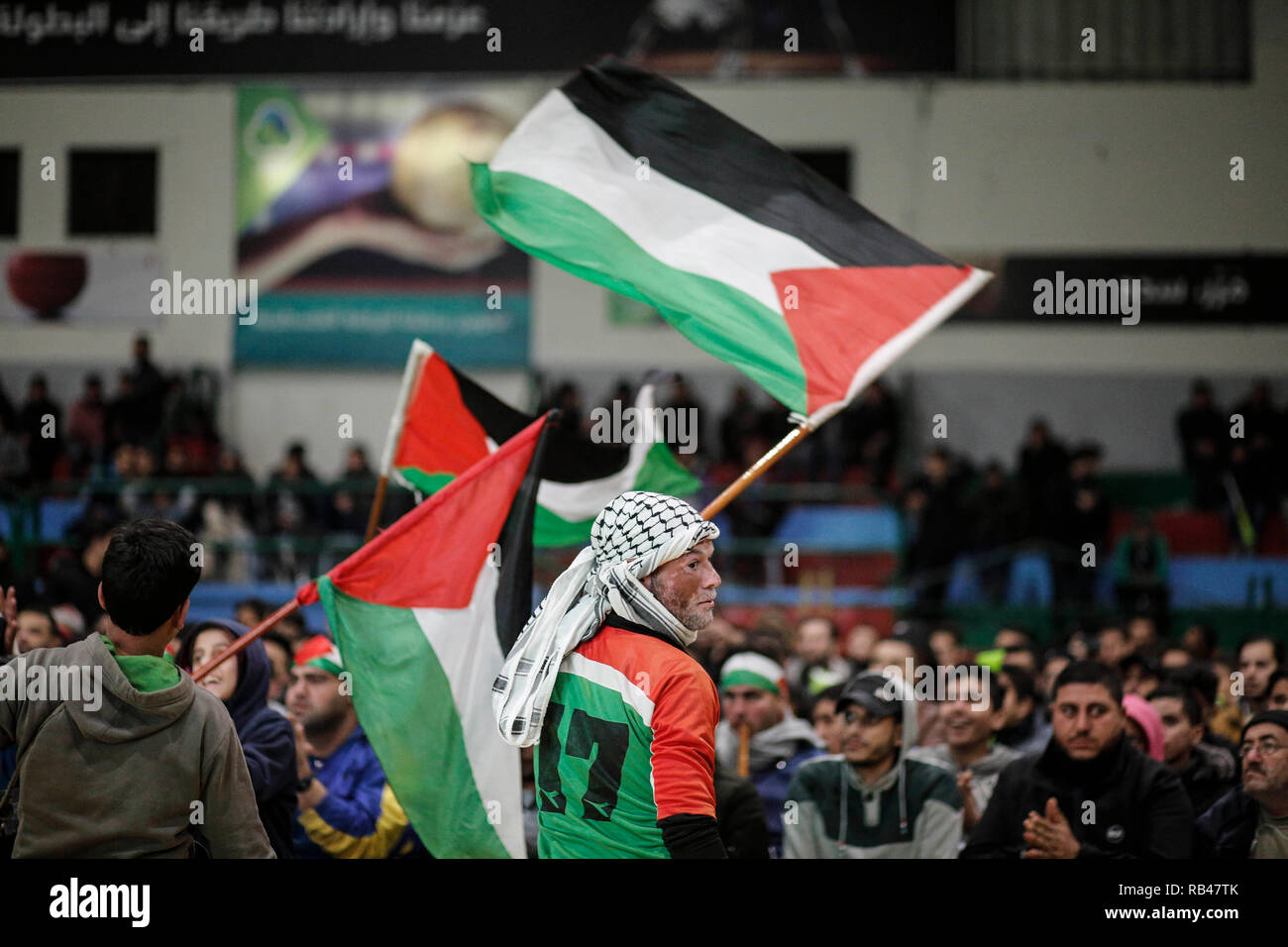 Gaza City, Palestine. 6th Jan 2019. A fan seen waving the Palestinian ...