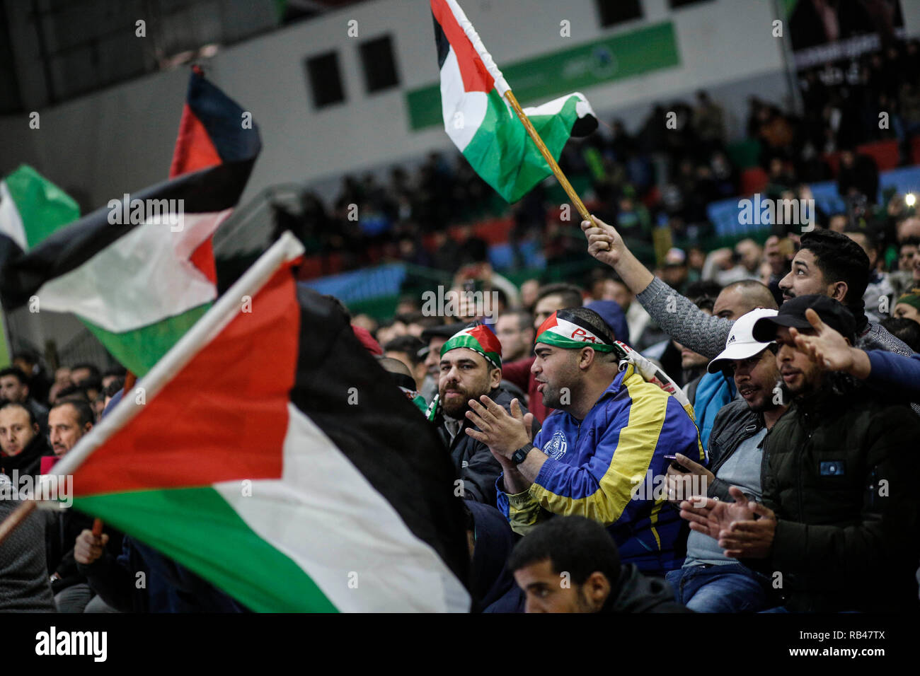 Gaza City, Palestine. 6th Jan 2019. A fan seen waving the Palestinian ...