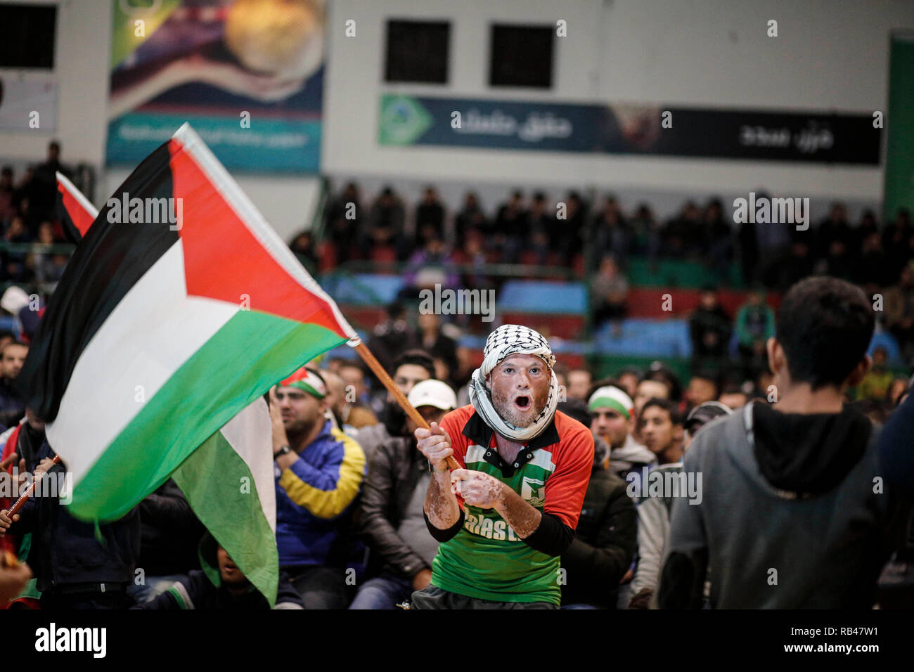 Gaza City, Palestine. 6th Jan 2019. A fan seen waving the Palestinian ...