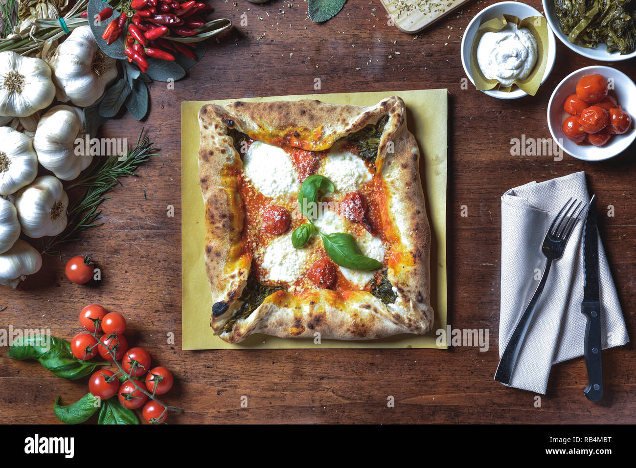 Top view backgound italian square pizza with cherry tomatoes, sauce ...