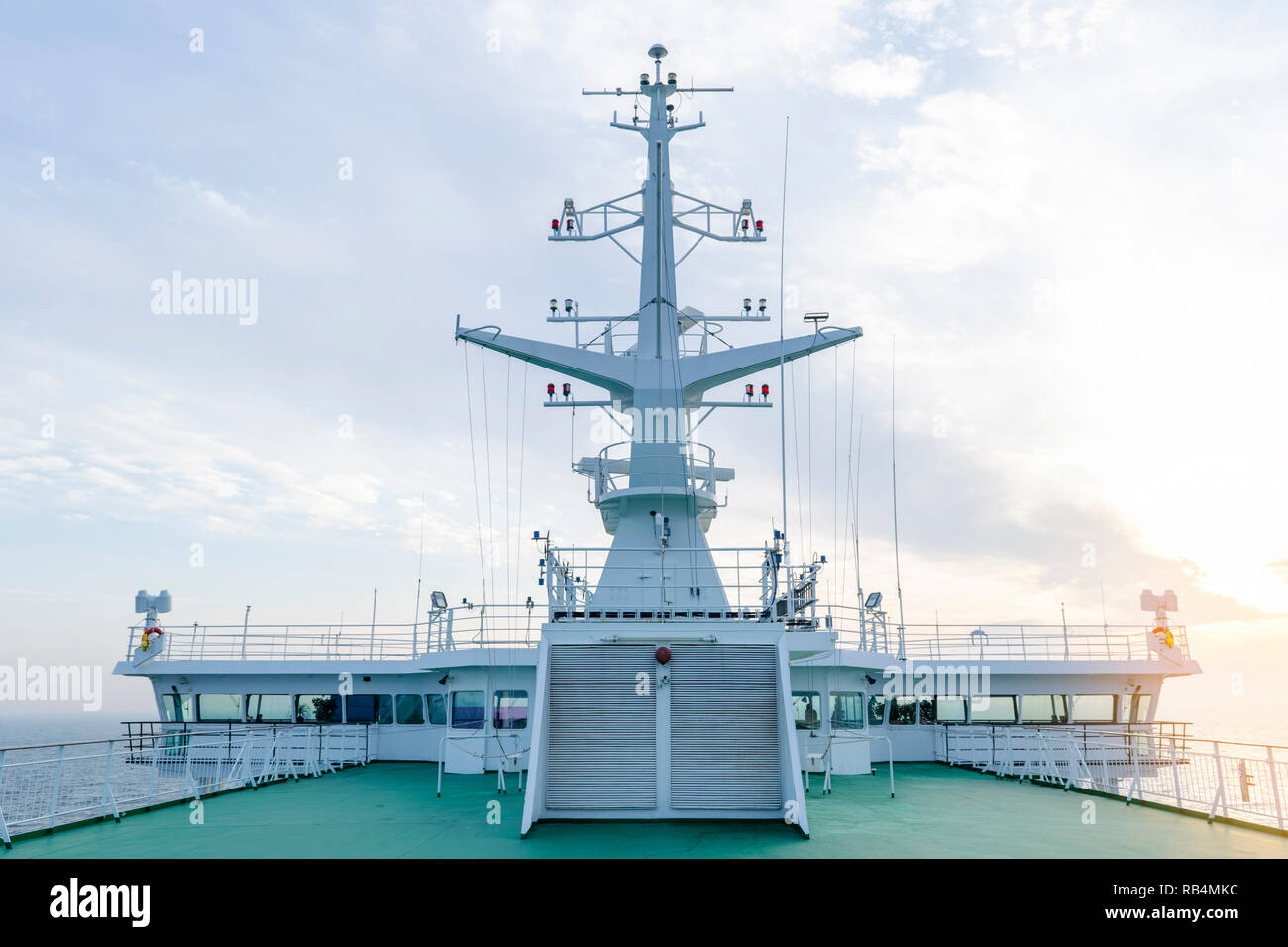 Cruise ship white cabin with big windows. Wing of running bridge of ...