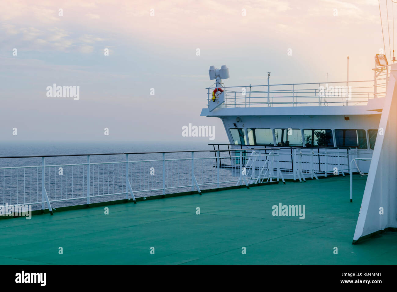 Cruise ship white cabin with big windows. Wing of running bridge of ...