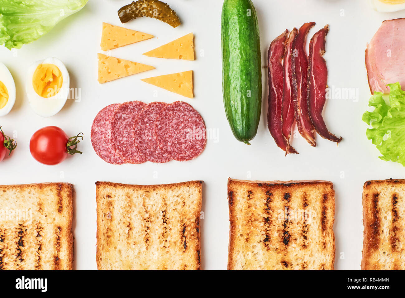 Sandwich ingredients on white background, top view Stock Photo - Alamy