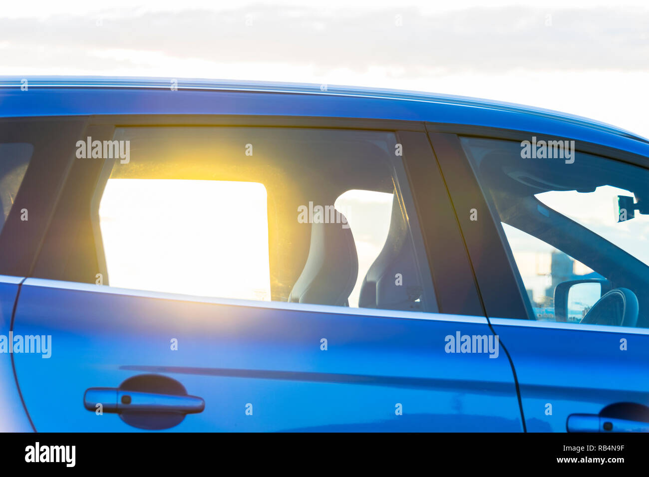 Sunset through the window of a modern car, car exterior details Stock ...