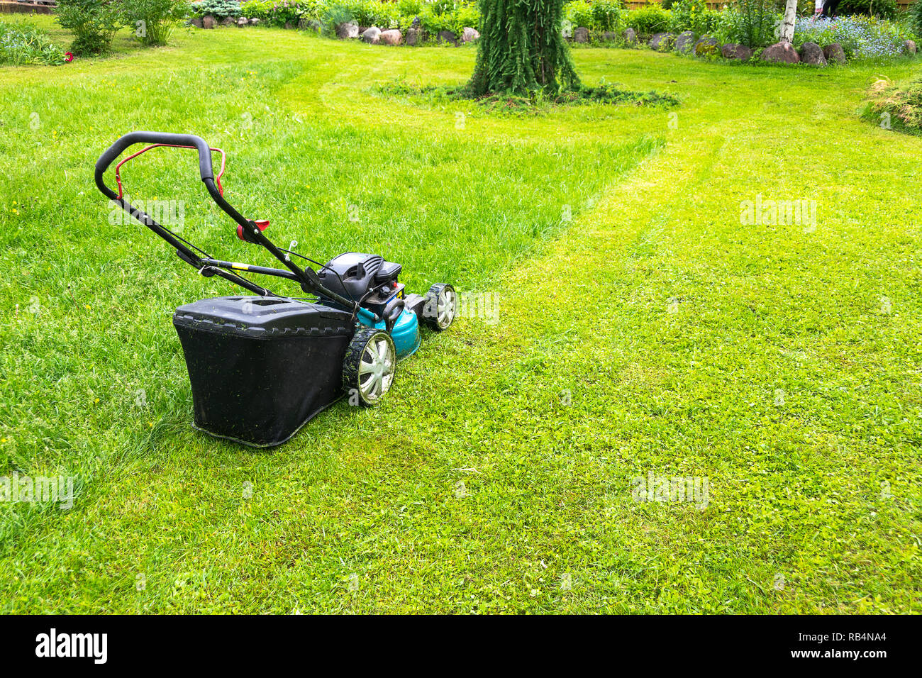 Mowing lawns, Lawn mower on green grass, mower grass equipment, mowing ...