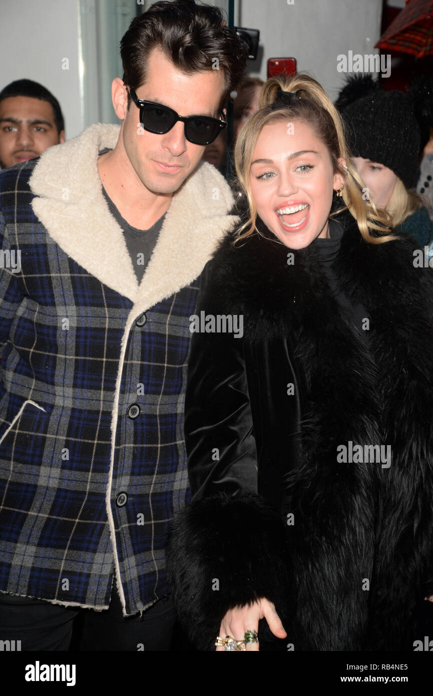 Miley Cyrus and Mark Ronson leave Capital Radio in a sea of fans and ...