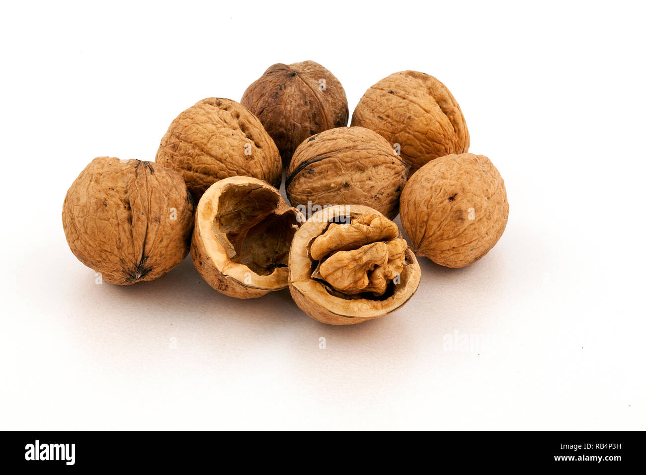 walnut broken group isolated Stock Photo - Alamy
