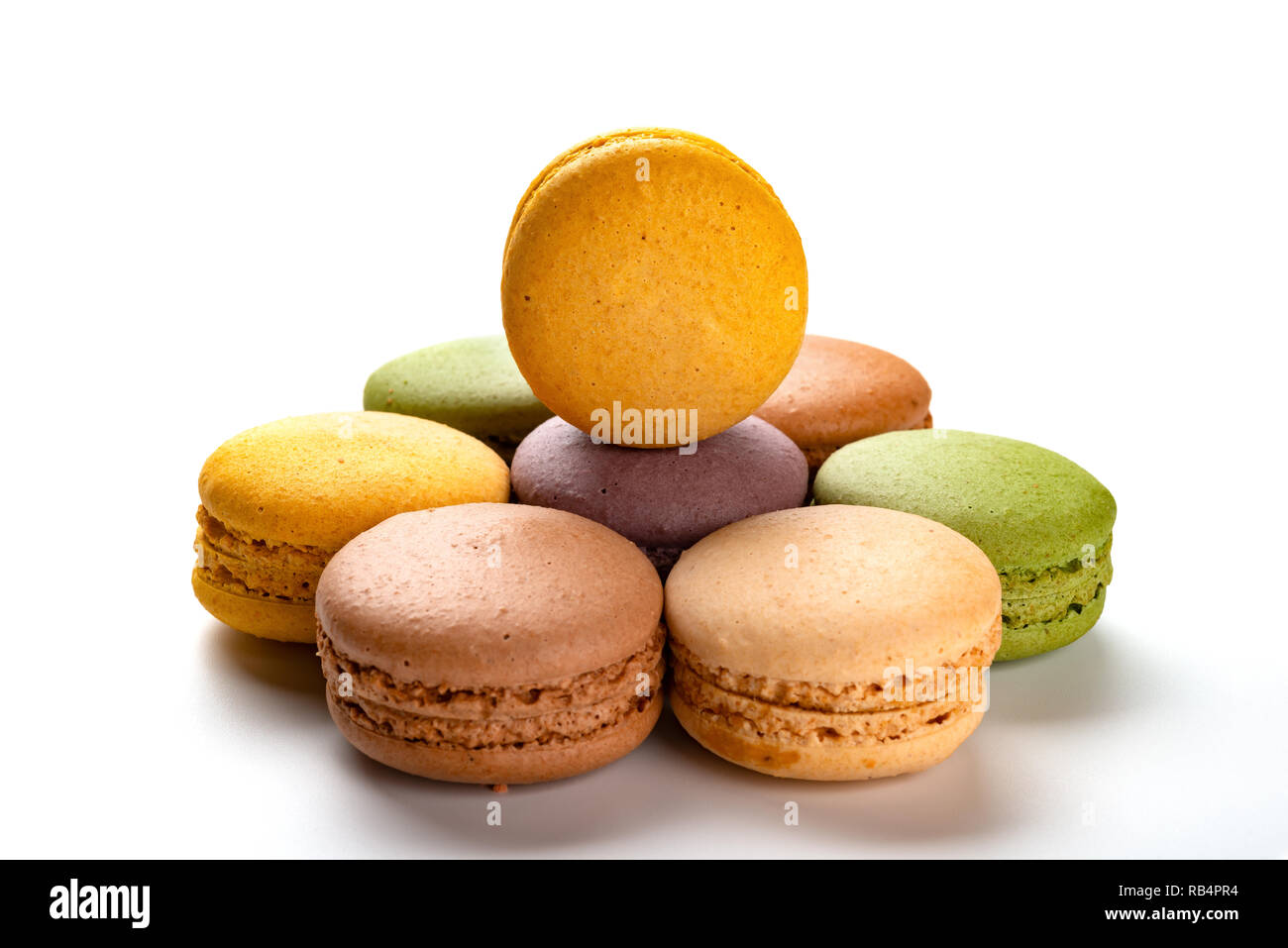 studio shoot of colorful macaroons stack up on a white background Stock ...