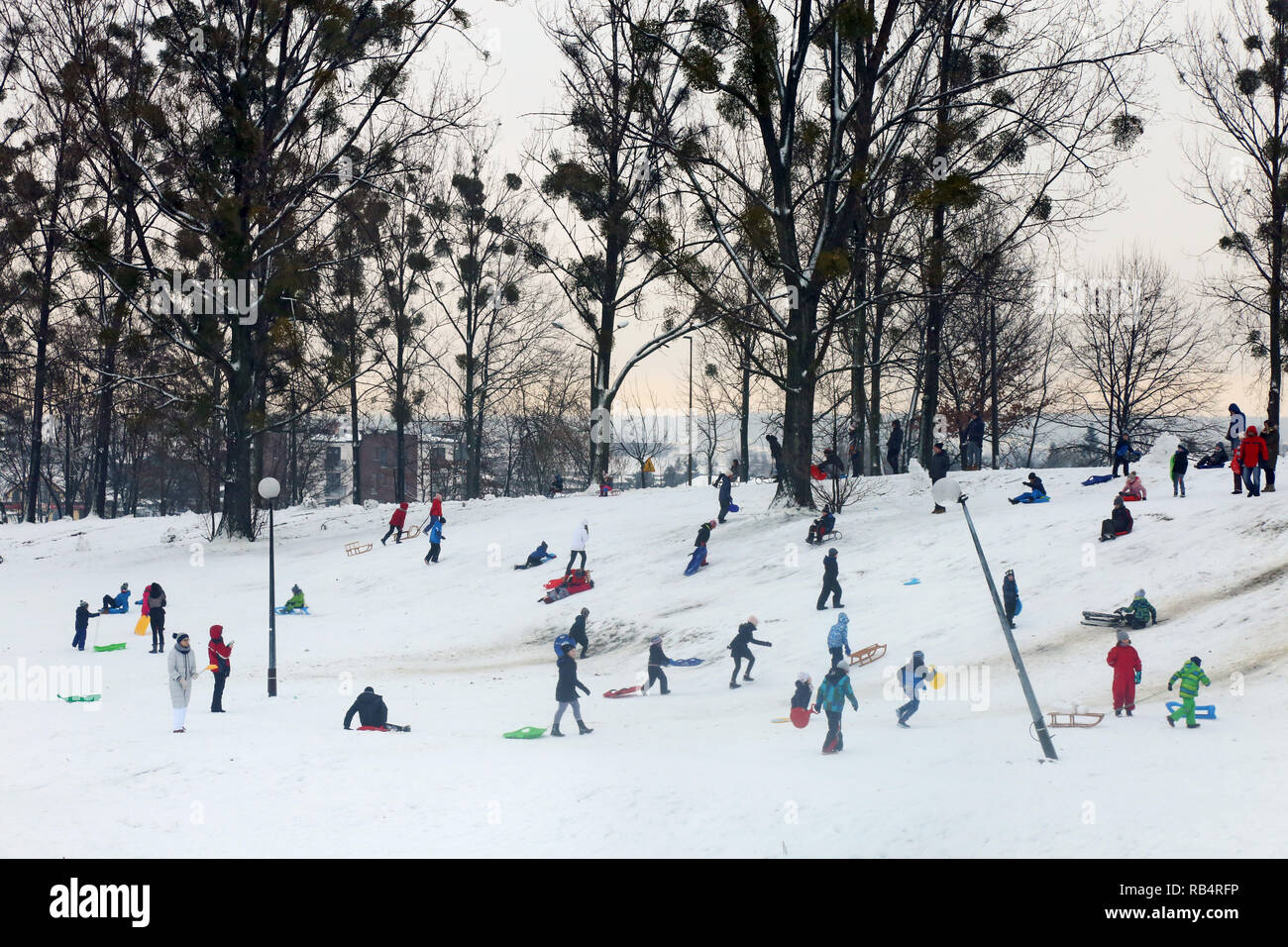 Parents with children spend Saturdays afternoon enjoying the charms of ...
