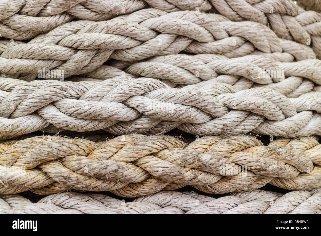 Old fashioned harbor marina sail boat ropes. Yachting details and ...