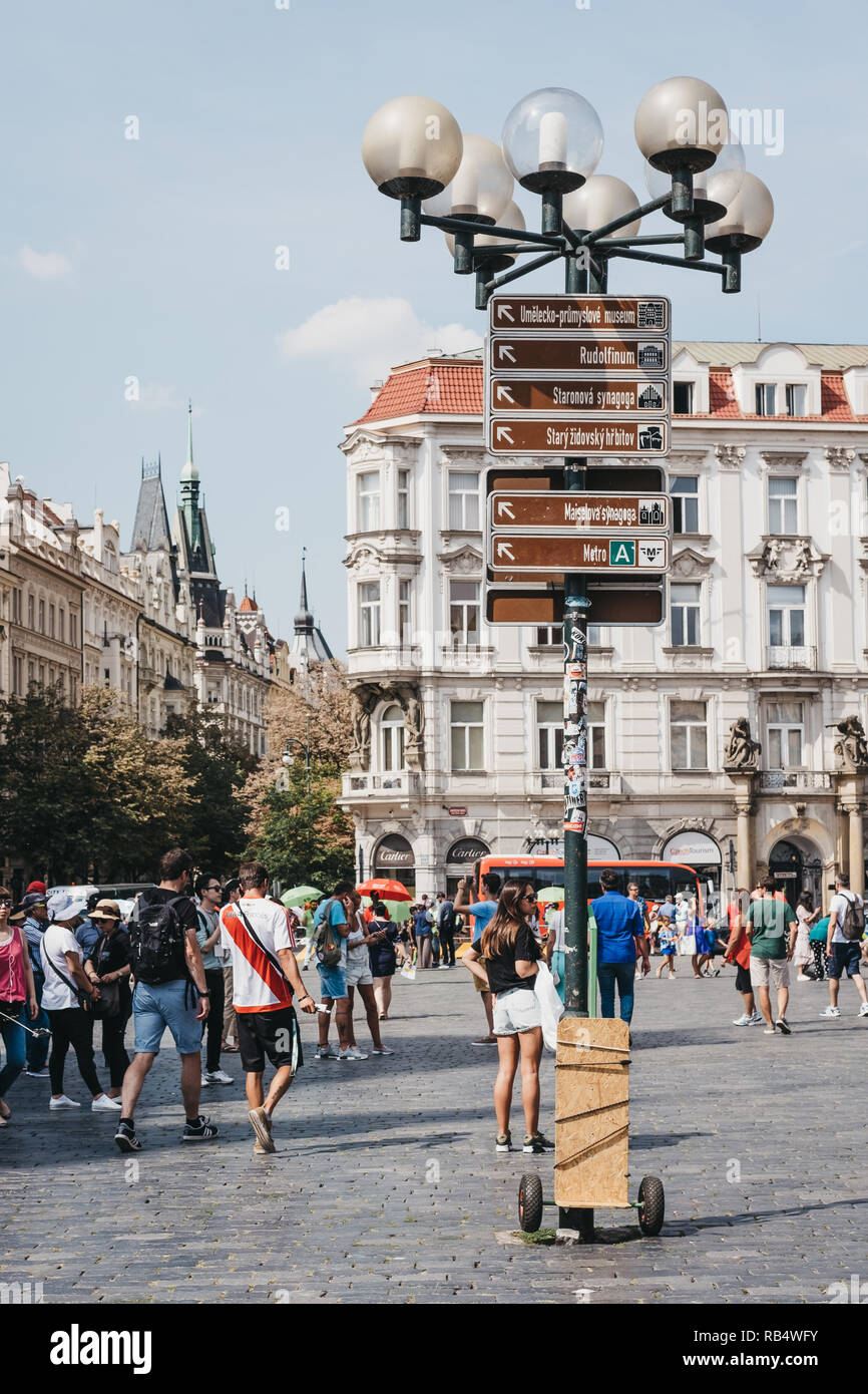 Prague, Czech Republic - August 23, 2018: Directional signs on lamp ...