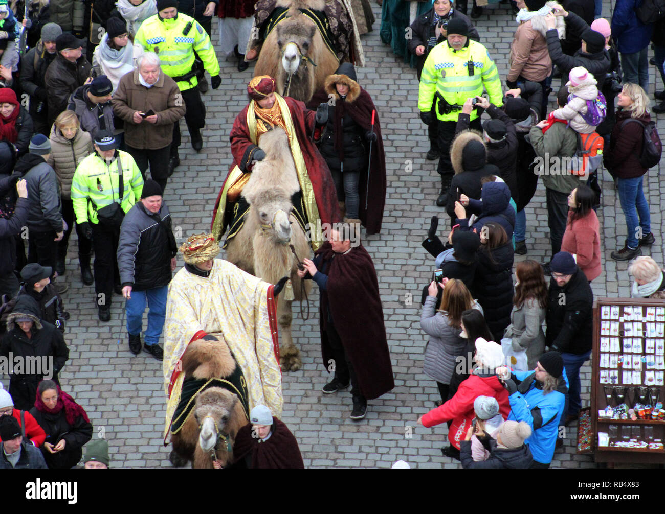 Passers-by and tourists watched the Epiphany procession with the Three ...