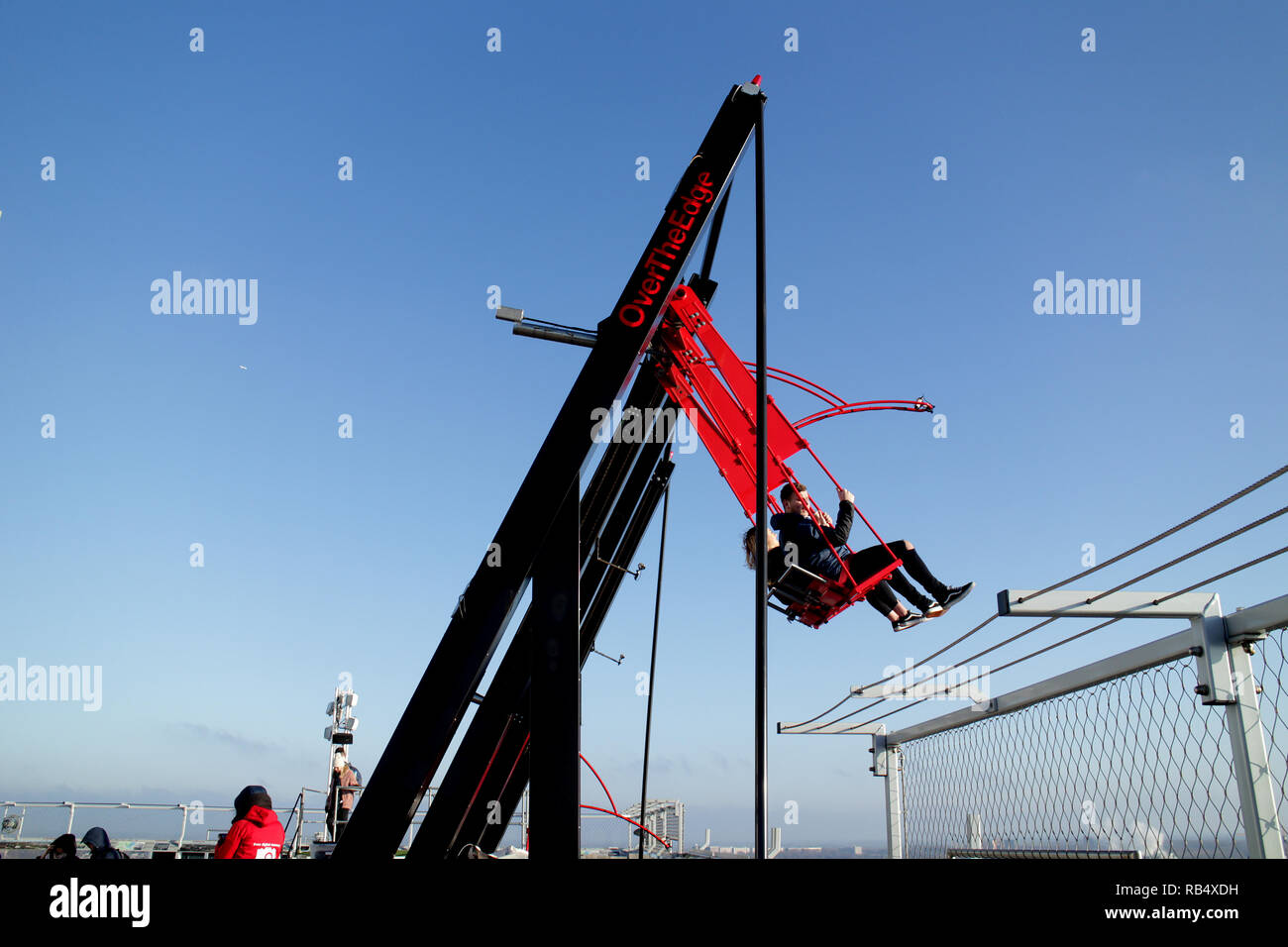 Adults on swings on rooftop of the Sir Adam Hotel, Amsterdam ...