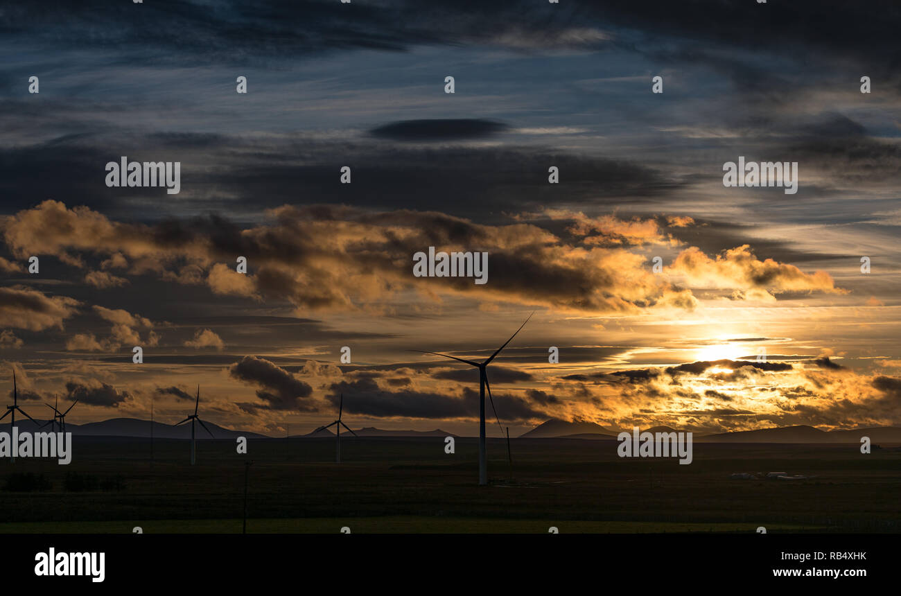 Wind farm turbines at sunset Stock Photo - Alamy