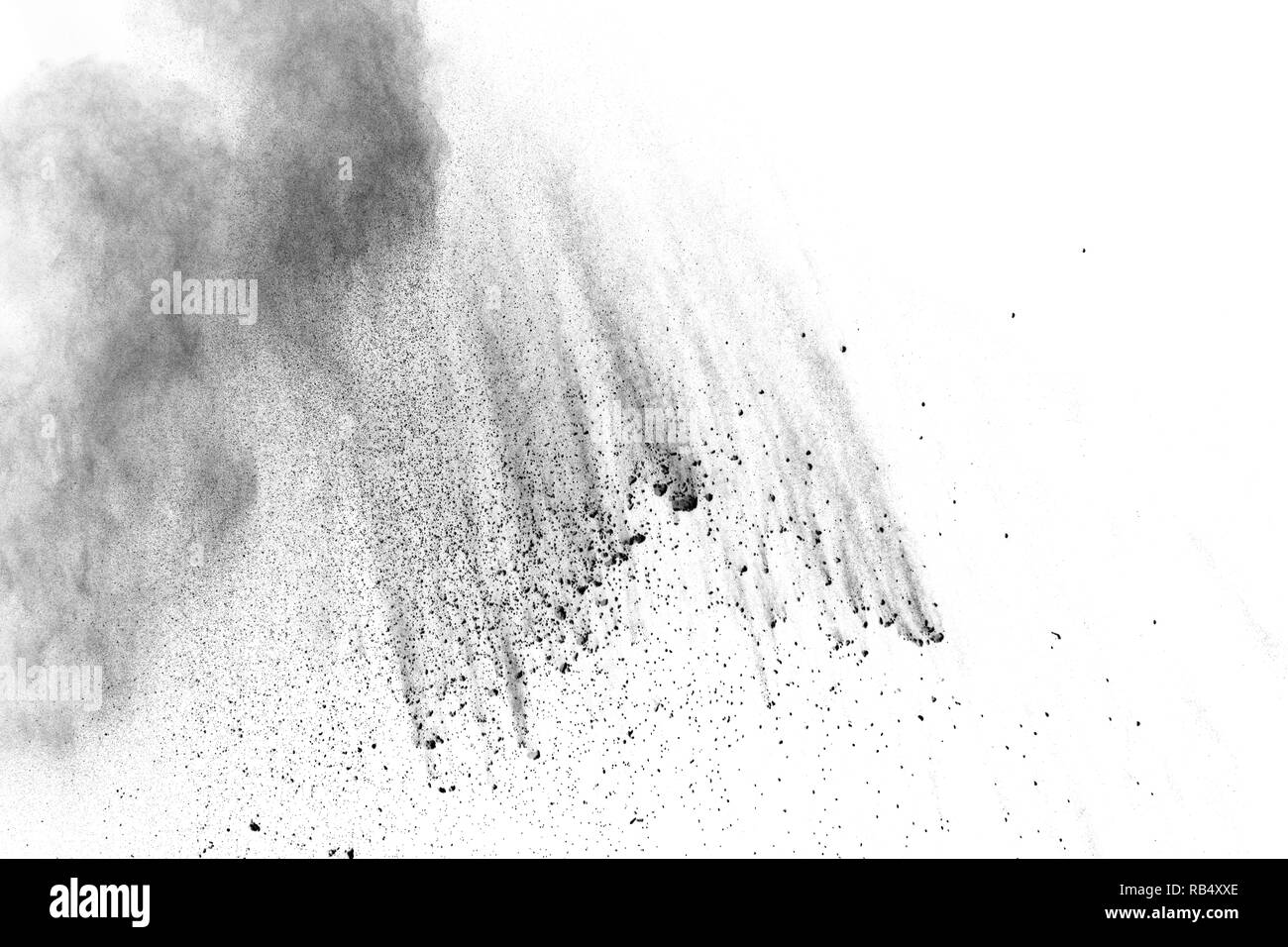 Black powder explosion against white background. Charcoal dust particle ...