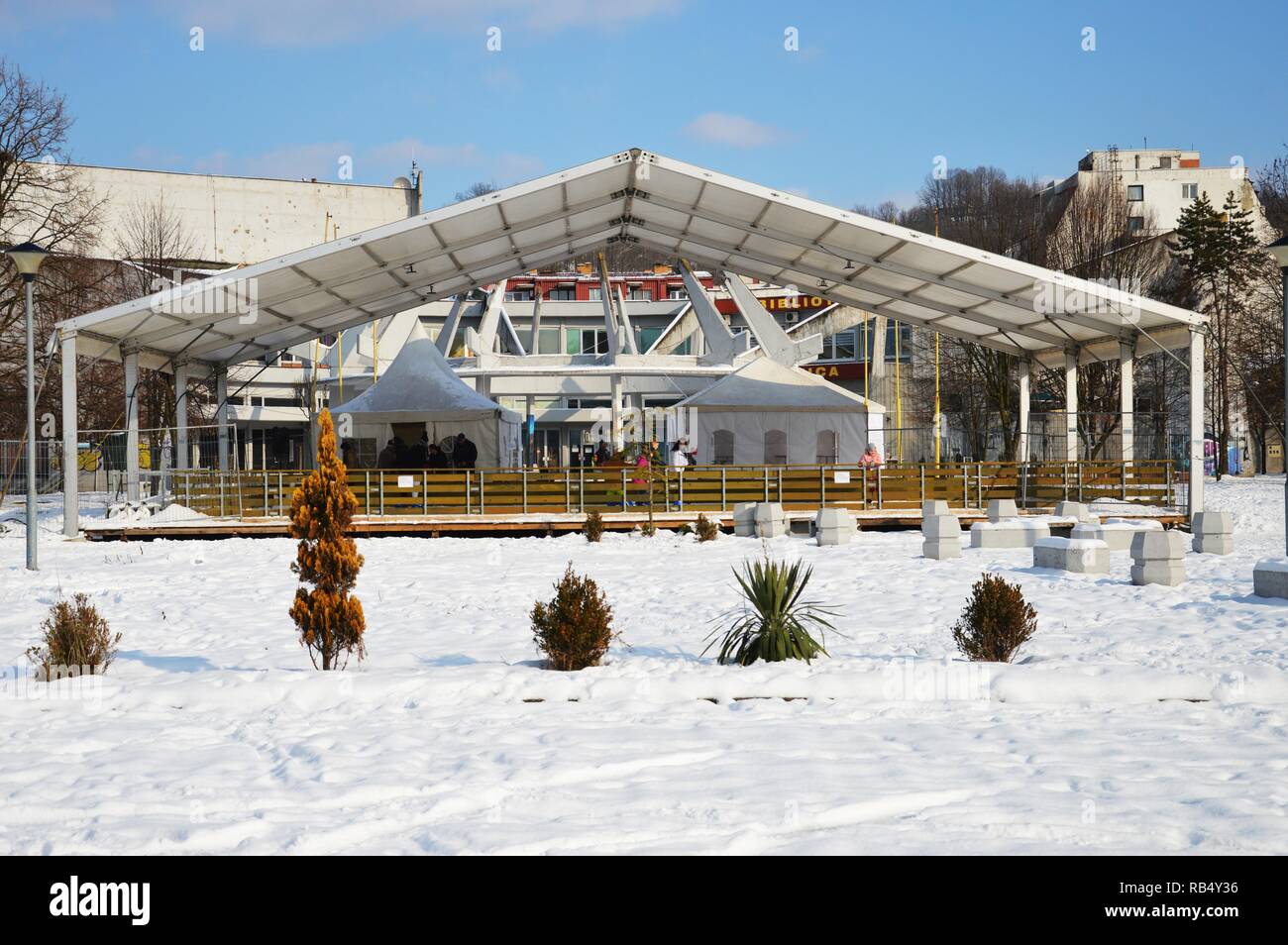 Open skating rink covered in the open air in town Stock Photo - Alamy