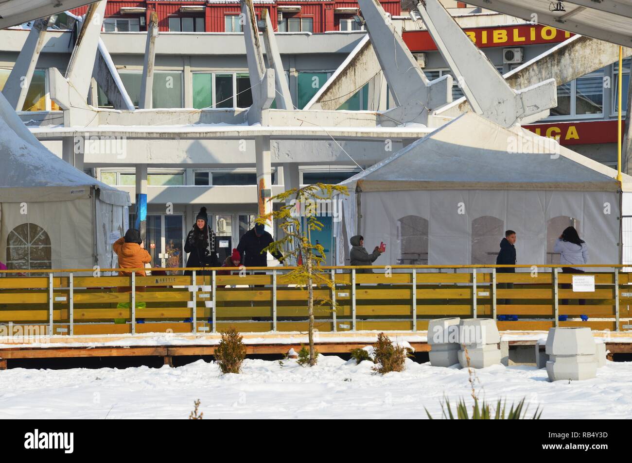 Open skating rink covered in the open air in town Stock Photo - Alamy